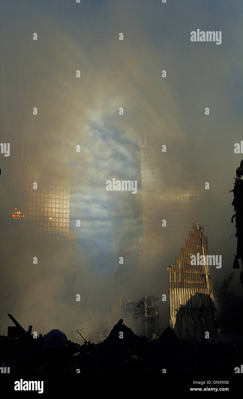 Sep. 12, 2001 - New York, New York, U.S. - Sunrise over the remains of ...