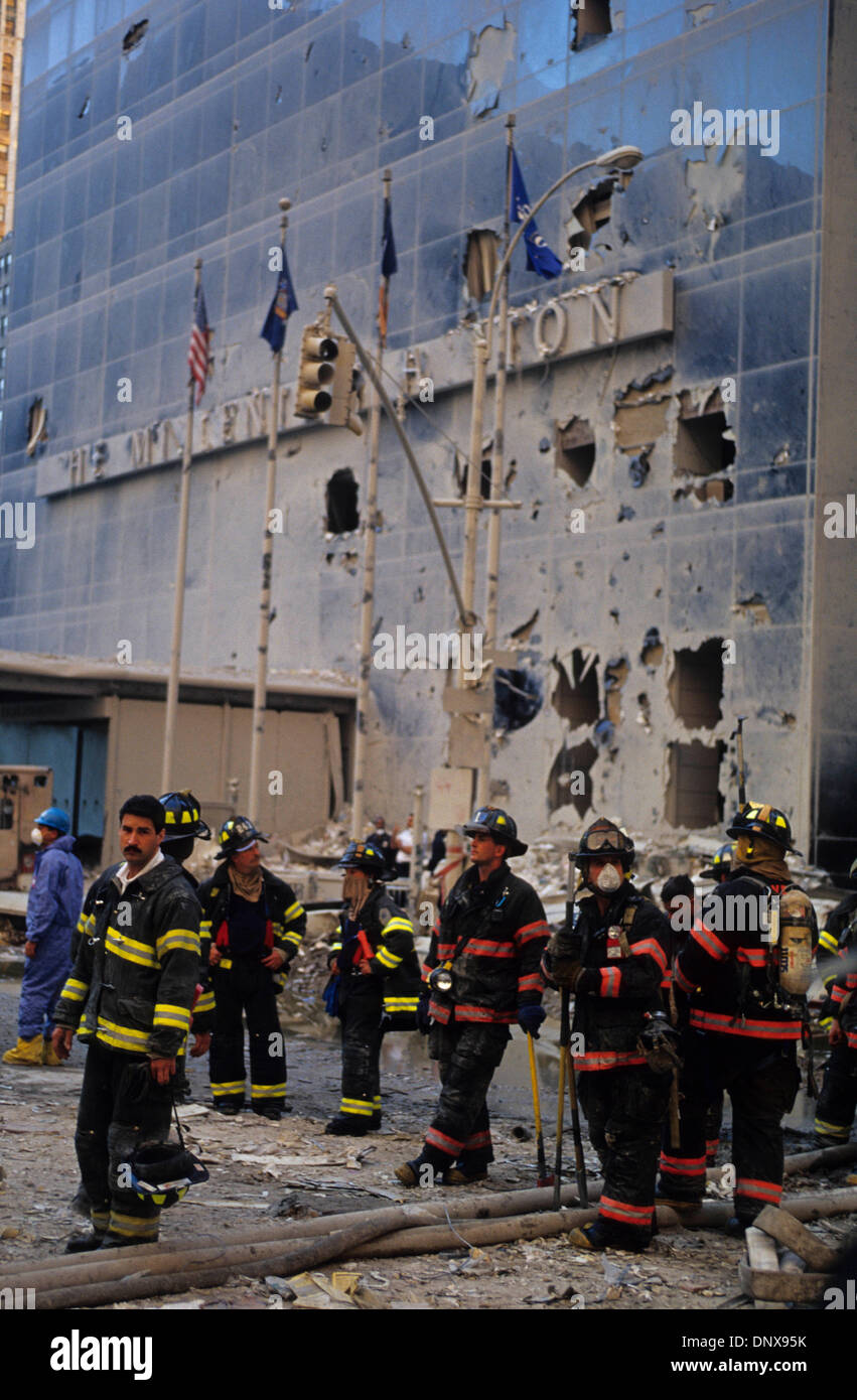 Sep. 12, 2001 - New York, New York, U.S. - Firefighters stand in front ...