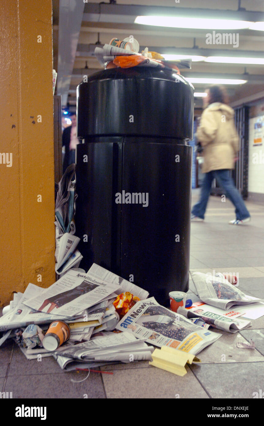 Dec 07, 2005; Manhattan, New York, USA; Garbage spills out of a trash ...