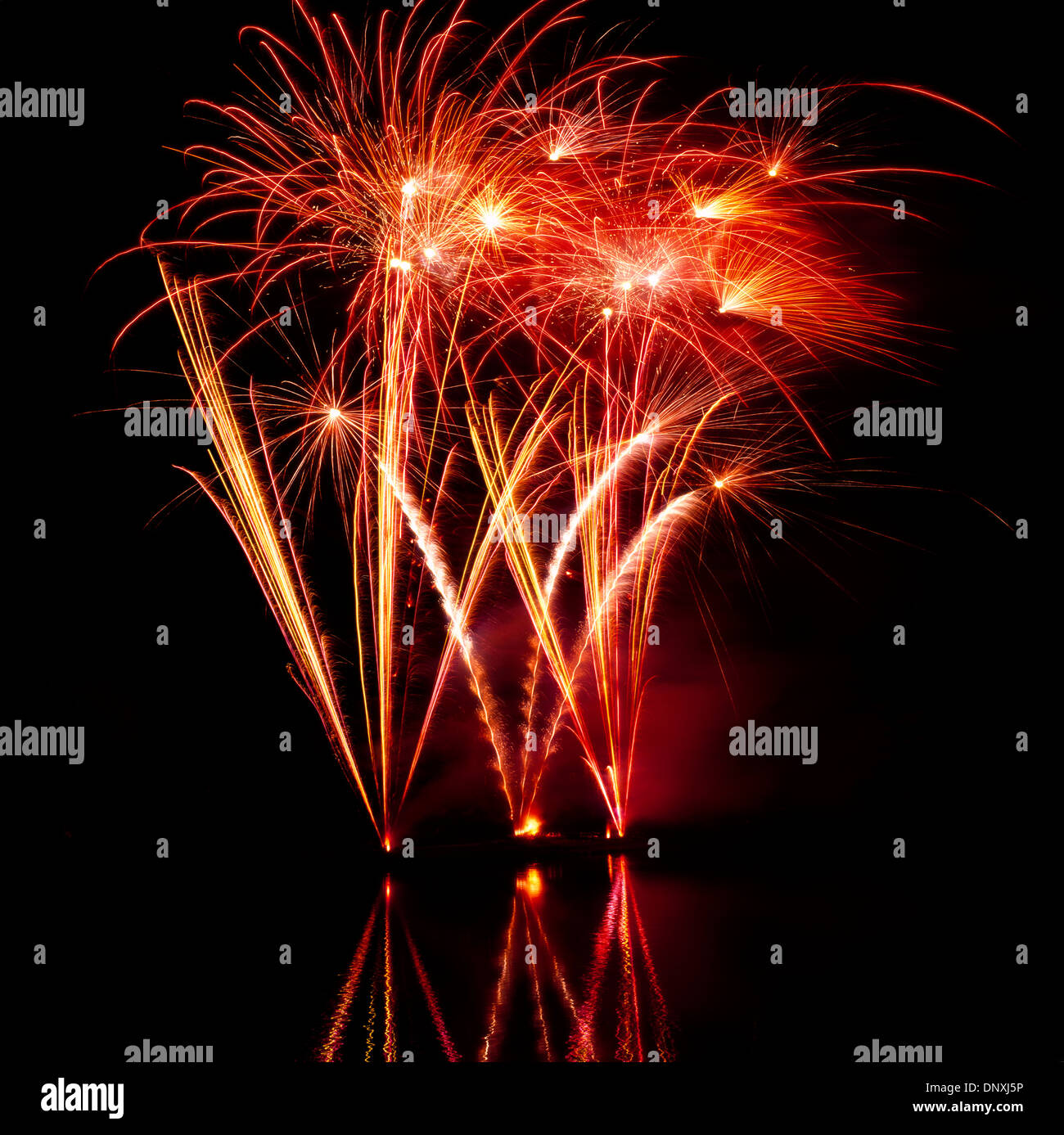 Fireworks over water Stock Photo - Alamy