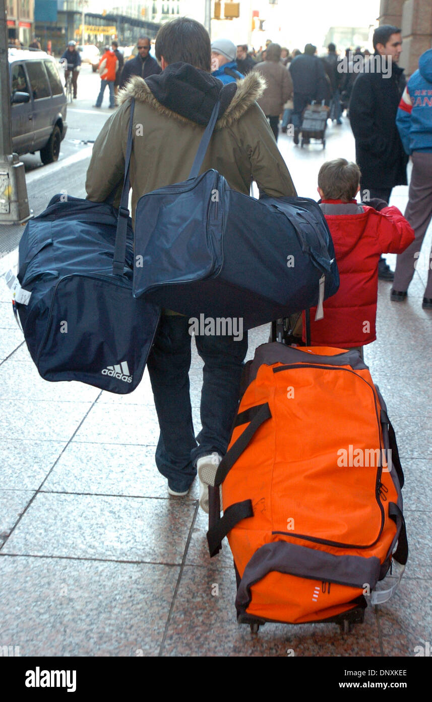 Dec 20, 2005; Manhattan, New York, USA; JOHN EMBRY with his son JAKE, 7 ...