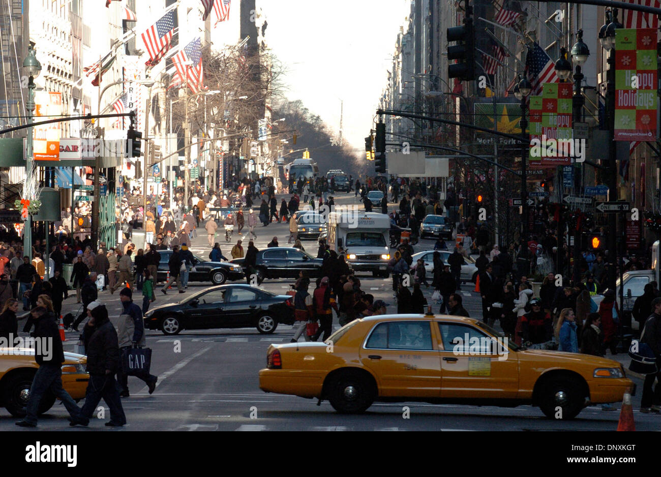 Dec 20, 2005; Manhattan, New York, USA; Pedestrians and traffic cross ...