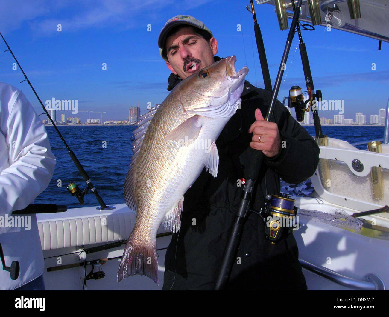 Dec 22, 2005; Miami Beach, FL, USA; LOU VOLPE shows the 8.5-pound ...