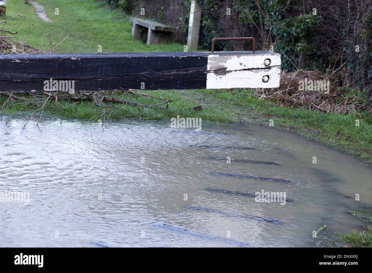 Narrow Lock gate on a canal Flooded Stock Photo - Alamy