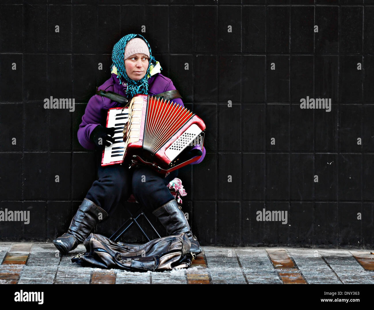 woman busker in street with accordion Stock Photo - Alamy