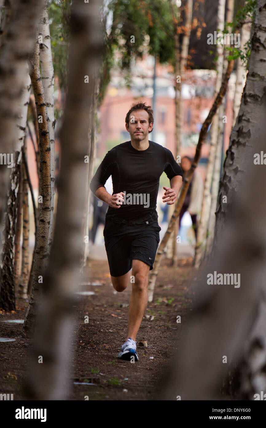 Gary Hicking, personal trainer in London, UK, keeping fit by jogging ...
