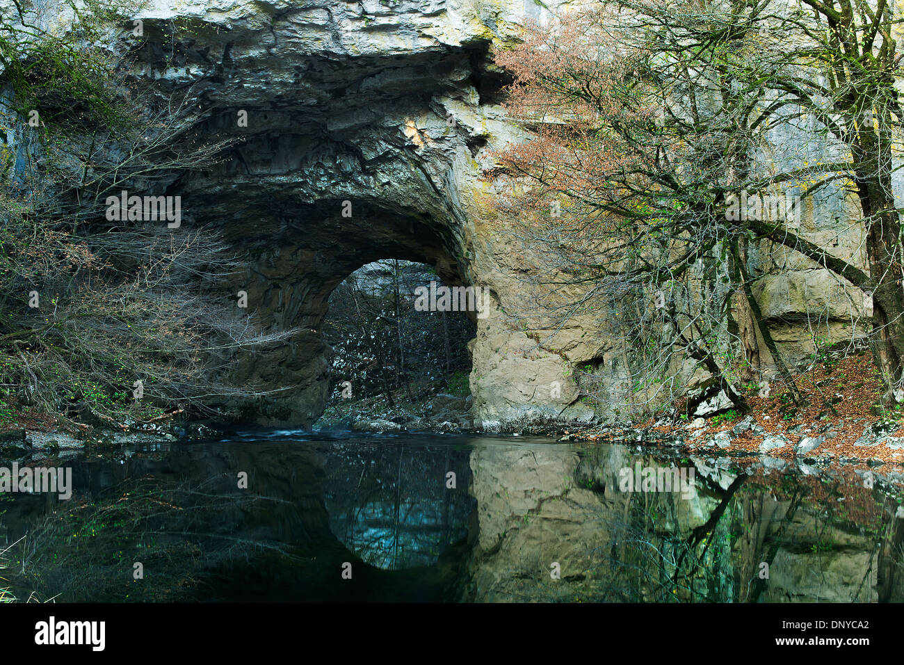 A natural arch in Rakov skocjan park Stock Photo - Alamy