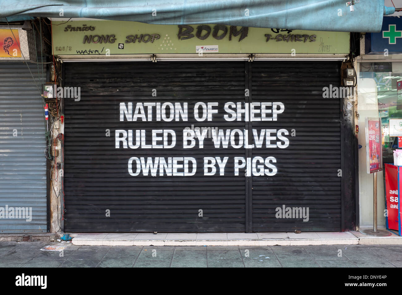 Nation of Sheep Ruled By Wolves Owned By Pigs - Shop front Khao Sahn ...