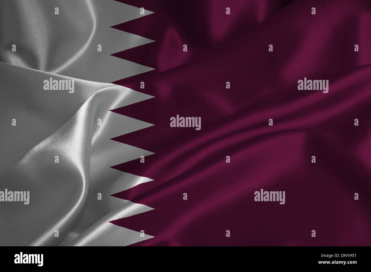 Qatar flag on satin texture Stock Photo - Alamy