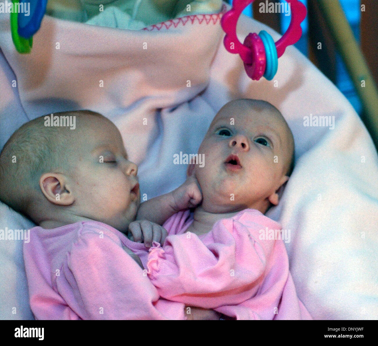 Feb 01, 2006; Fargo, ND, USA; (Left to right) Abbigail Carlsen sleeps ...