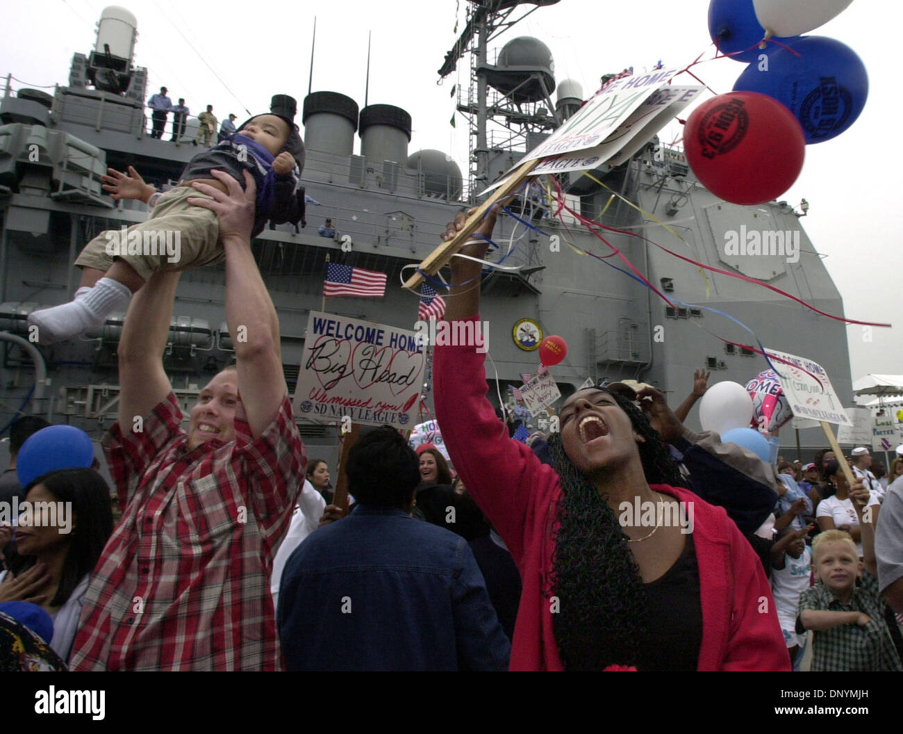 (Published on SignOn: 06/02/2003) Jeremy Rideout holds up his son ...