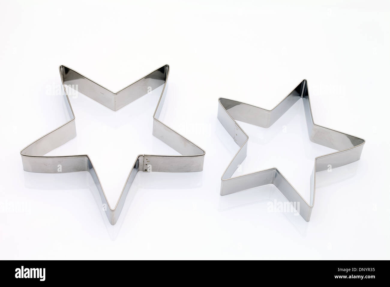 Star shaped cookie cutter on white background Stock Photo - Alamy