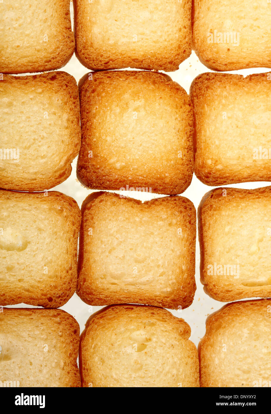 Many small dried rusks bread loaf toast biscuits as texture background ...