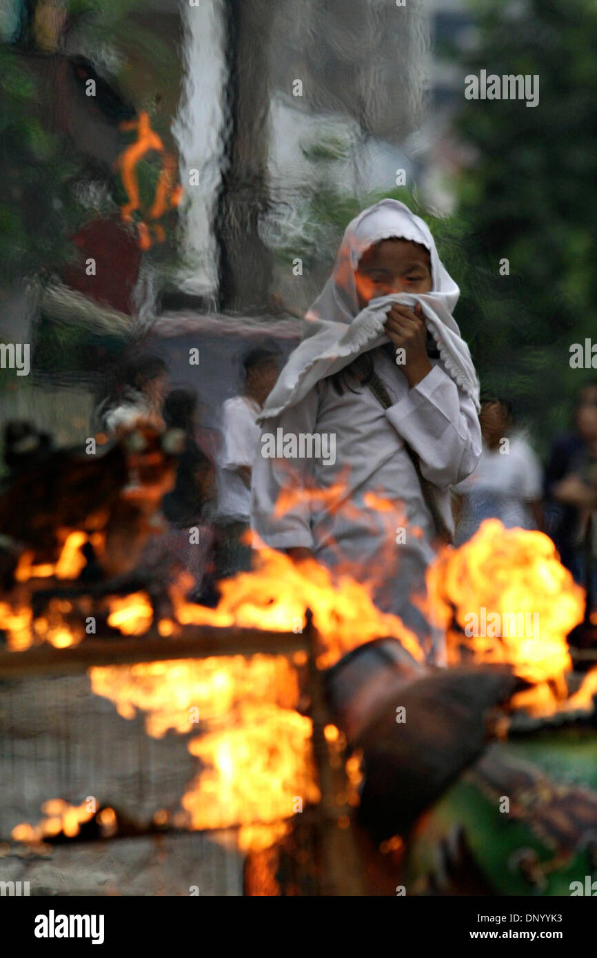 Feb 17, 2006; Jakarta, INDONESIA; Residents burn birds and its caves ...