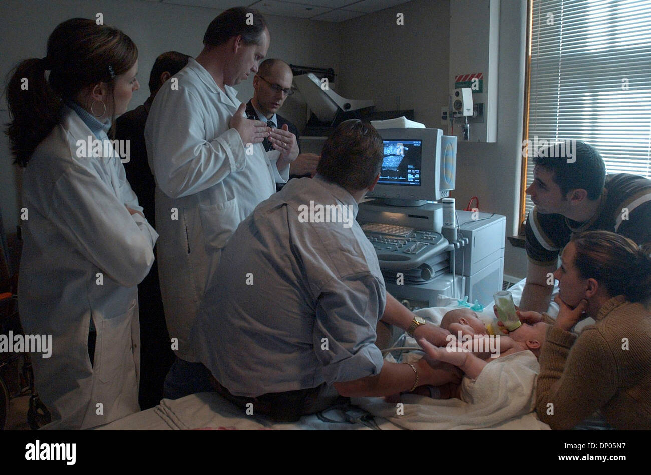 Conjoined twins hands hi-res stock photography and images - Alamy