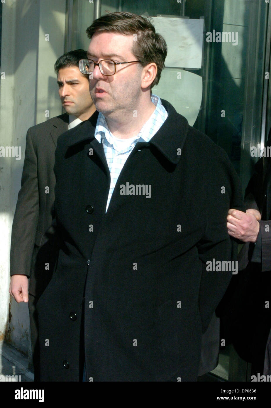 Mar 03, 2006; Manhattan, New York, USA; JAMES COLLITON, 42, is led from ...