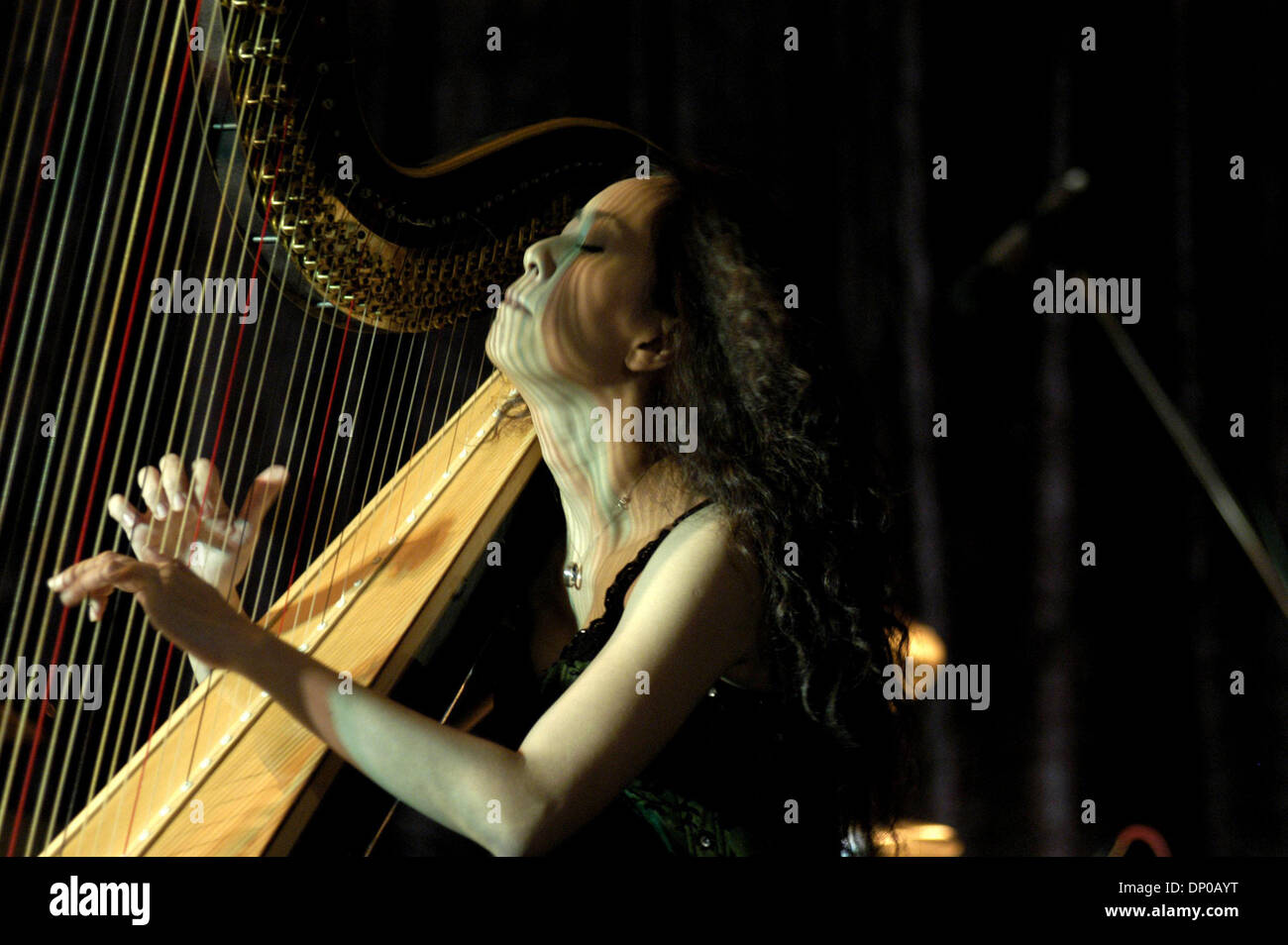 Mar 05, 2006; Jakarta, INDONESIA; MAYA HASAN perfoms with her harp ...