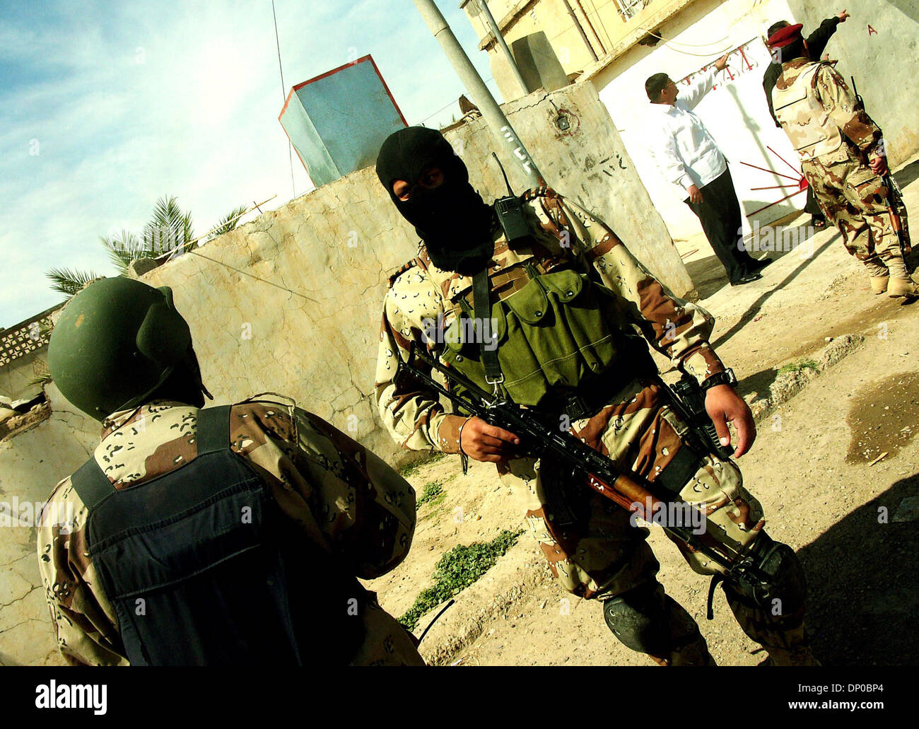 Mar 07, 2006; Ad Dawr, Saluhidin, IRAQ; Iraqi soldiers talk during a ...