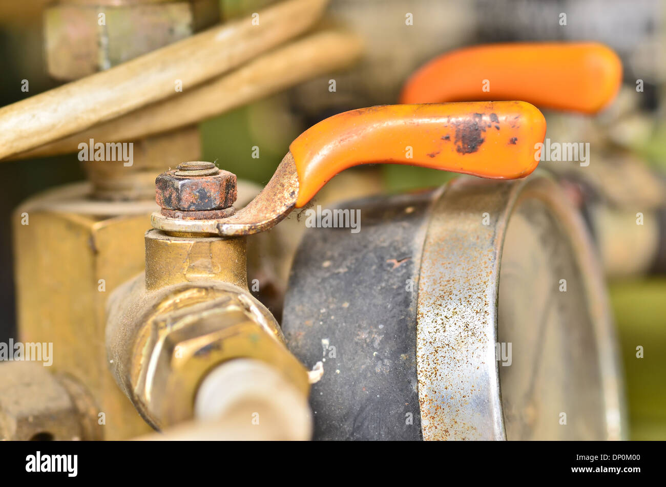 rusty small valve Stock Photo - Alamy