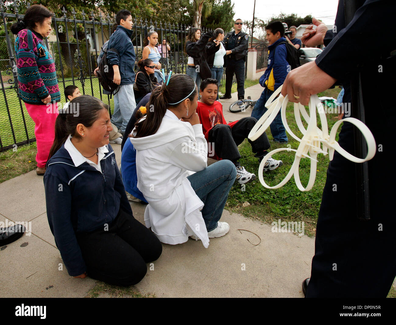 Mar 30, 2006; San Diego, CA, USA; GUADALUPE ORTEGA, 11, left, a student ...