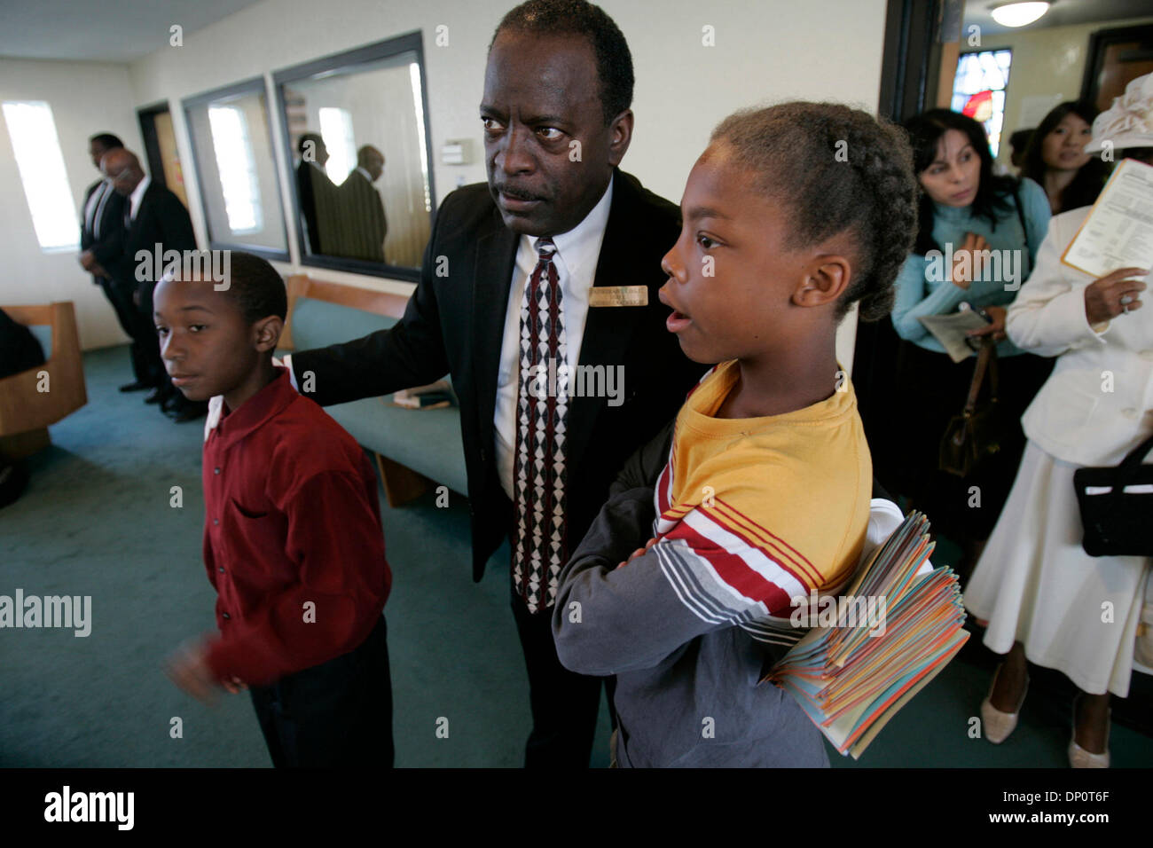 Apr 02, 2006; San Diego, CA, USA; Deacon THOMAS CARTWRIGHT helps two ...