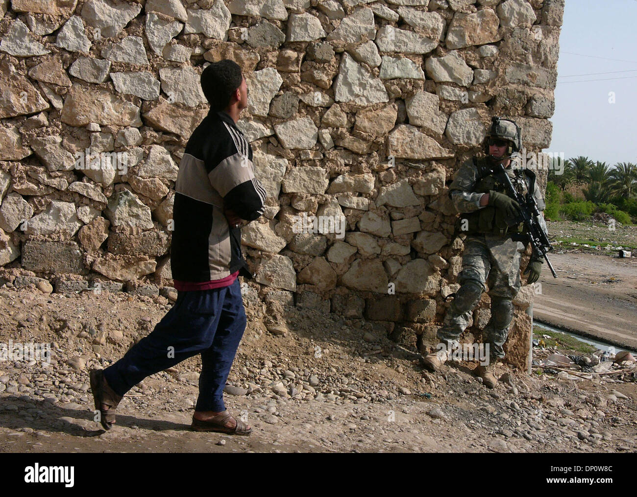 Apr 04, 2006; Bayji, Saluhidin, IRAQ; Iraqi boys follow Sgt. JASON ...