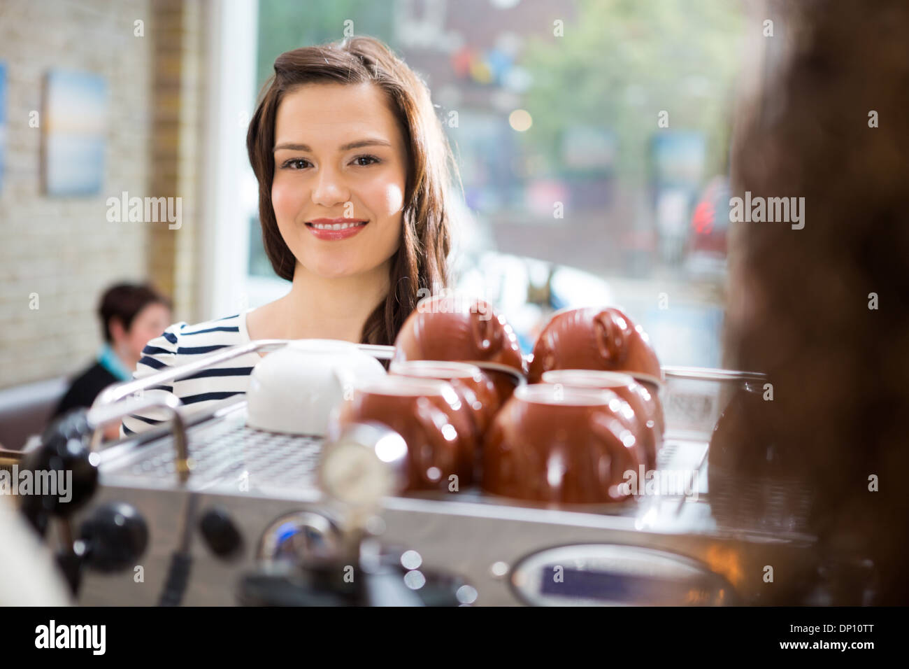 Girl in coffeeshop hi-res stock photography and images - Alamy
