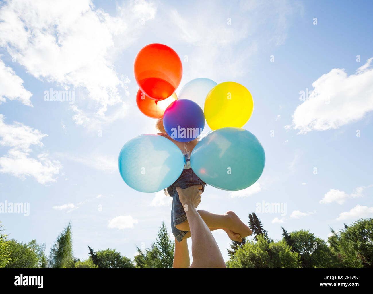 Woman carrying balloon hi-res stock photography and images - Alamy