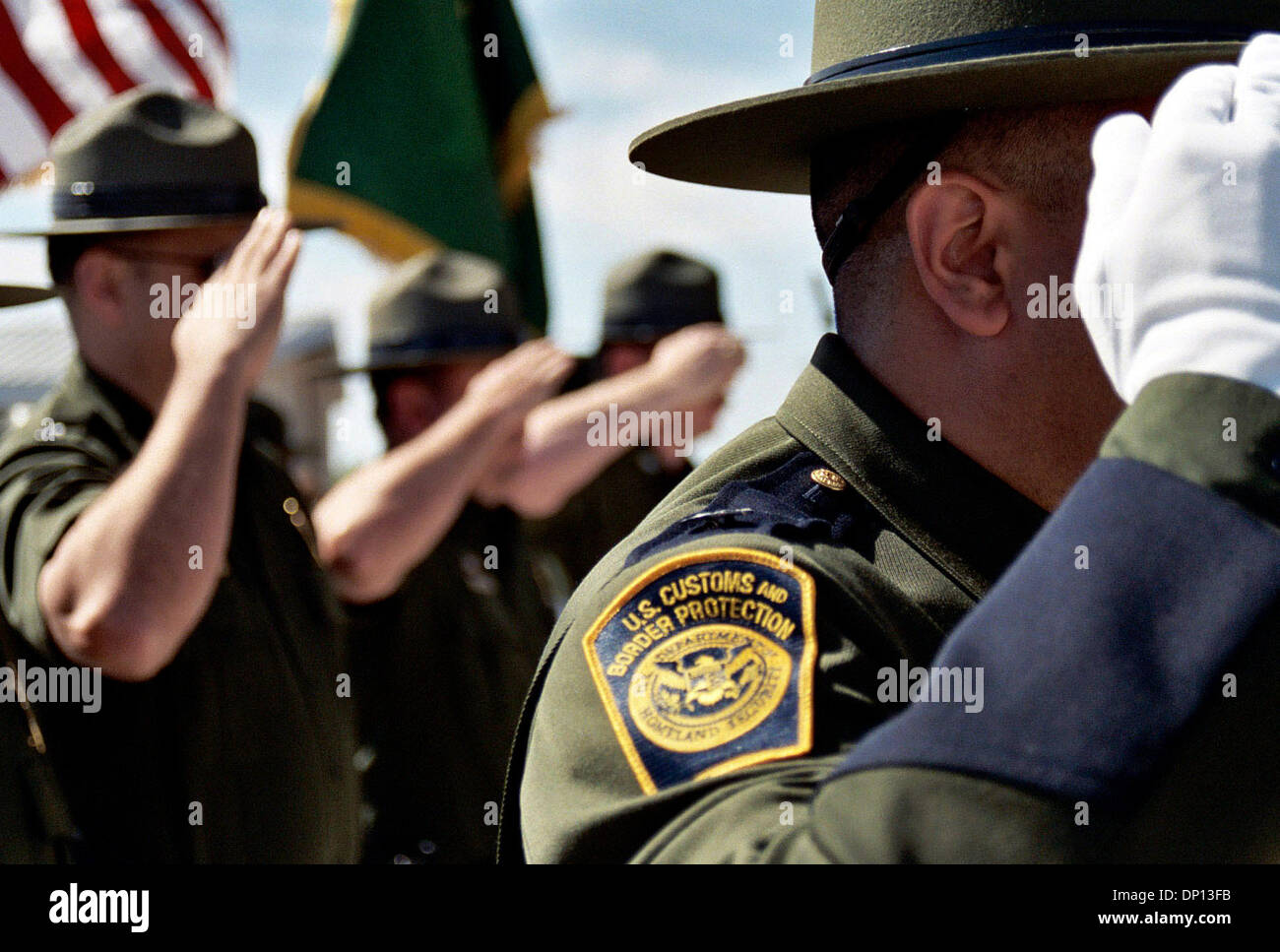 Apr 14, 2006; Laredo, TX, USA; Border Patrol agents salute during a ...