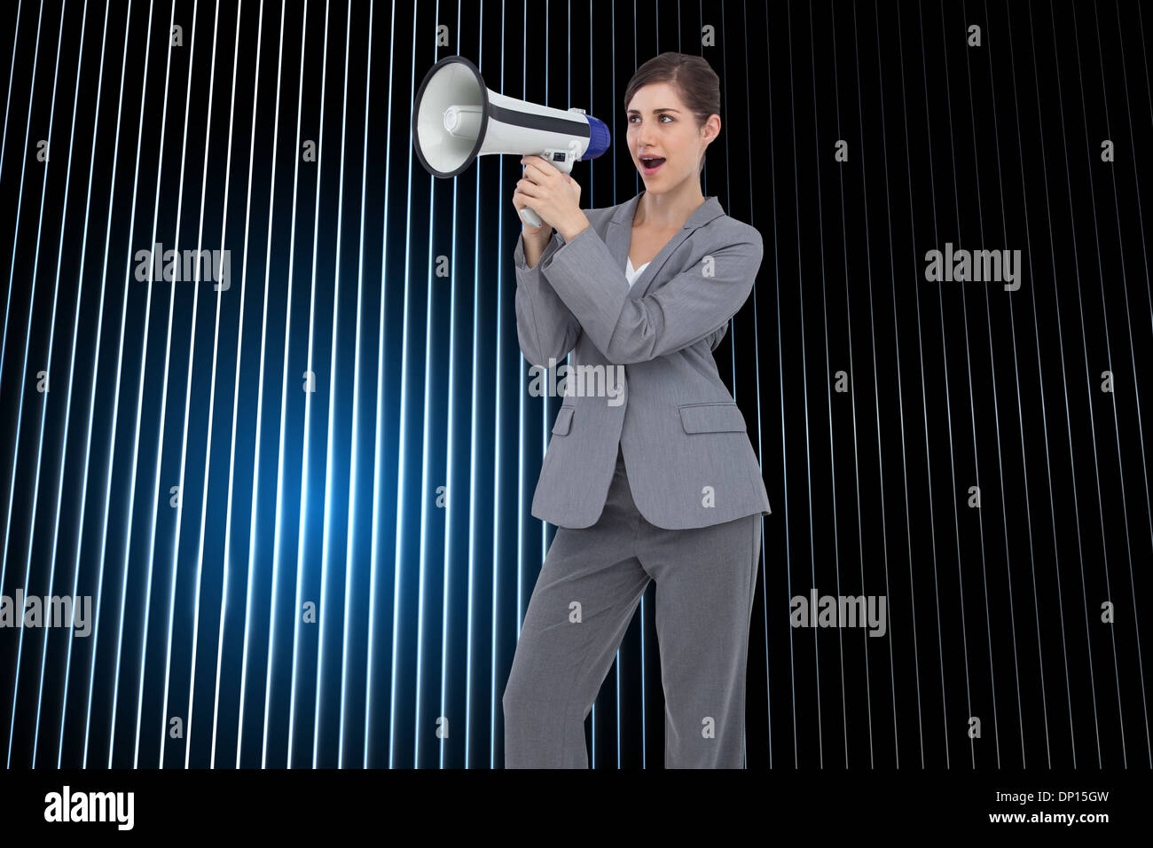 Composite image of businesswoman with loudspeaker Stock Photo - Alamy