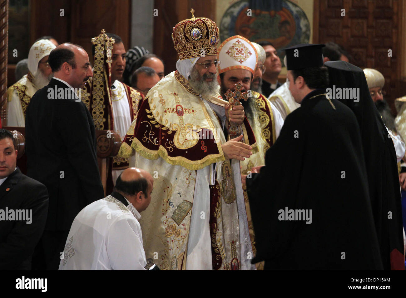 Cairo, Cairo, Egypt. 6th Jan, 2014. Coptic Pope Tawadros II, swings an ...