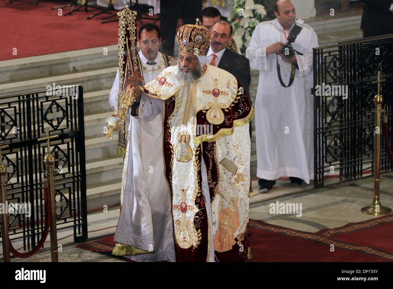 Cairo, Cairo, Egypt. 6th Jan, 2014. Coptic Pope Tawadros II, swings an ...