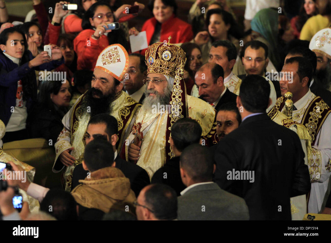 Cairo, Cairo, Egypt. 6th Jan, 2014. Coptic Pope Tawadros II, swings an ...
