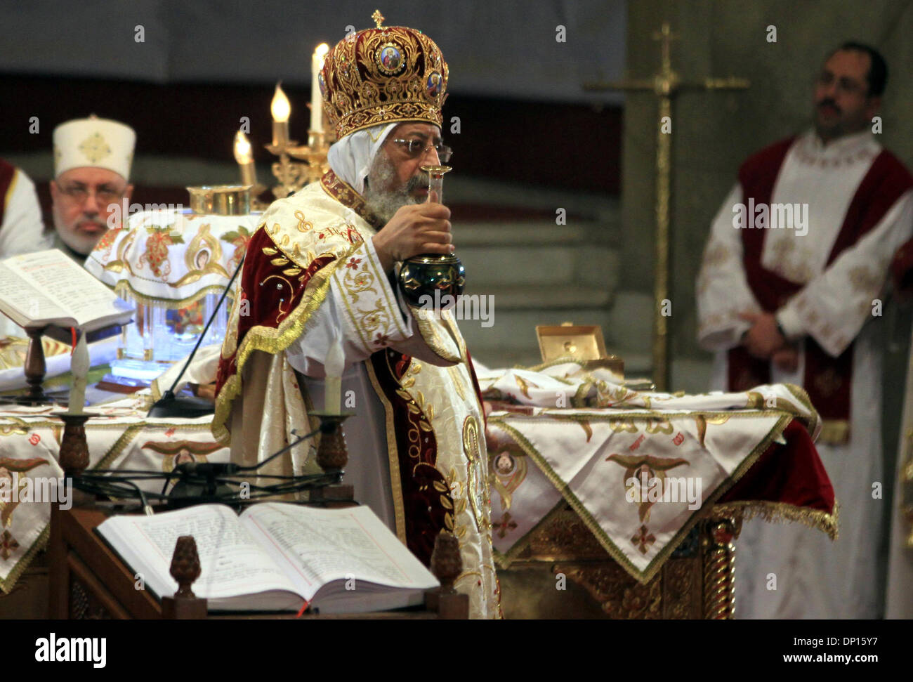 Cairo, Cairo, Egypt. 6th Jan, 2014. Coptic Pope Tawadros II, swings an ...