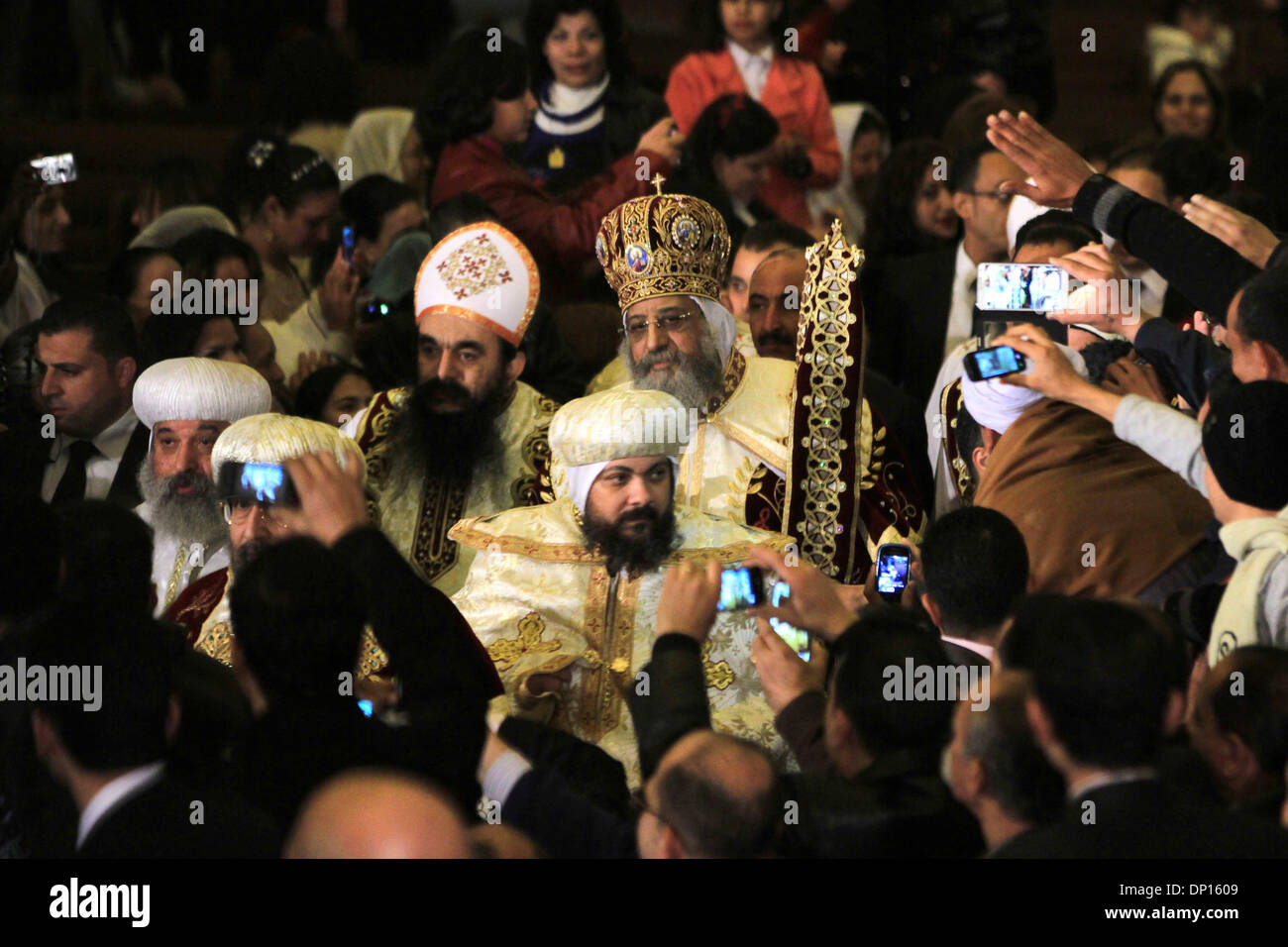 Cairo, Cairo, Egypt. 6th Jan, 2014. Coptic Pope Tawadros II, swings an ...