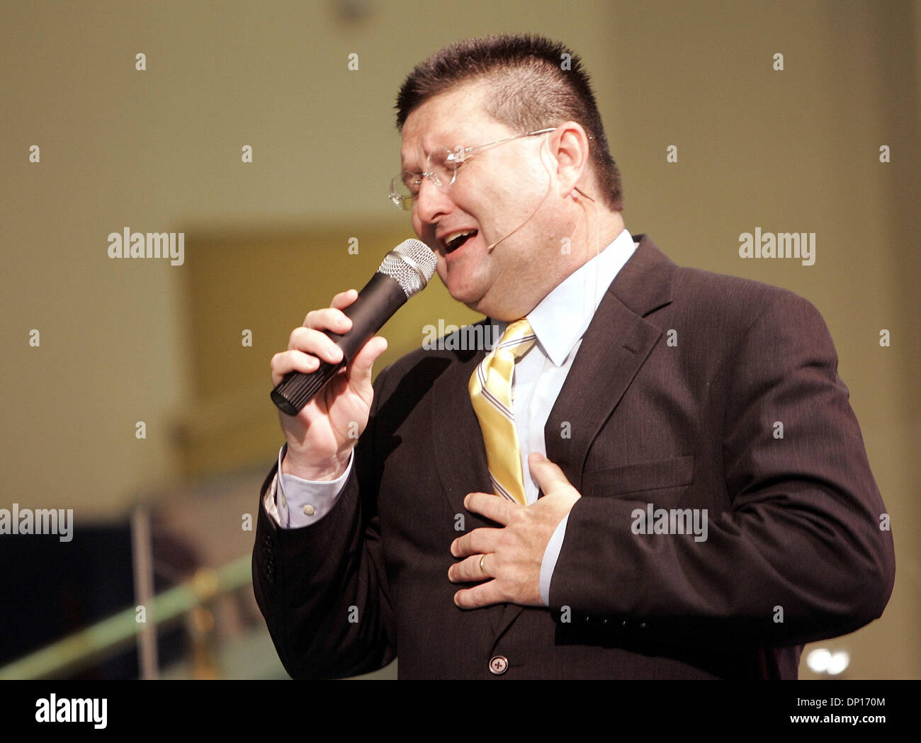 Apr 22, 2006; Boca Raton, FL, USA; Pastor Mark Boykin sings to his wife ...