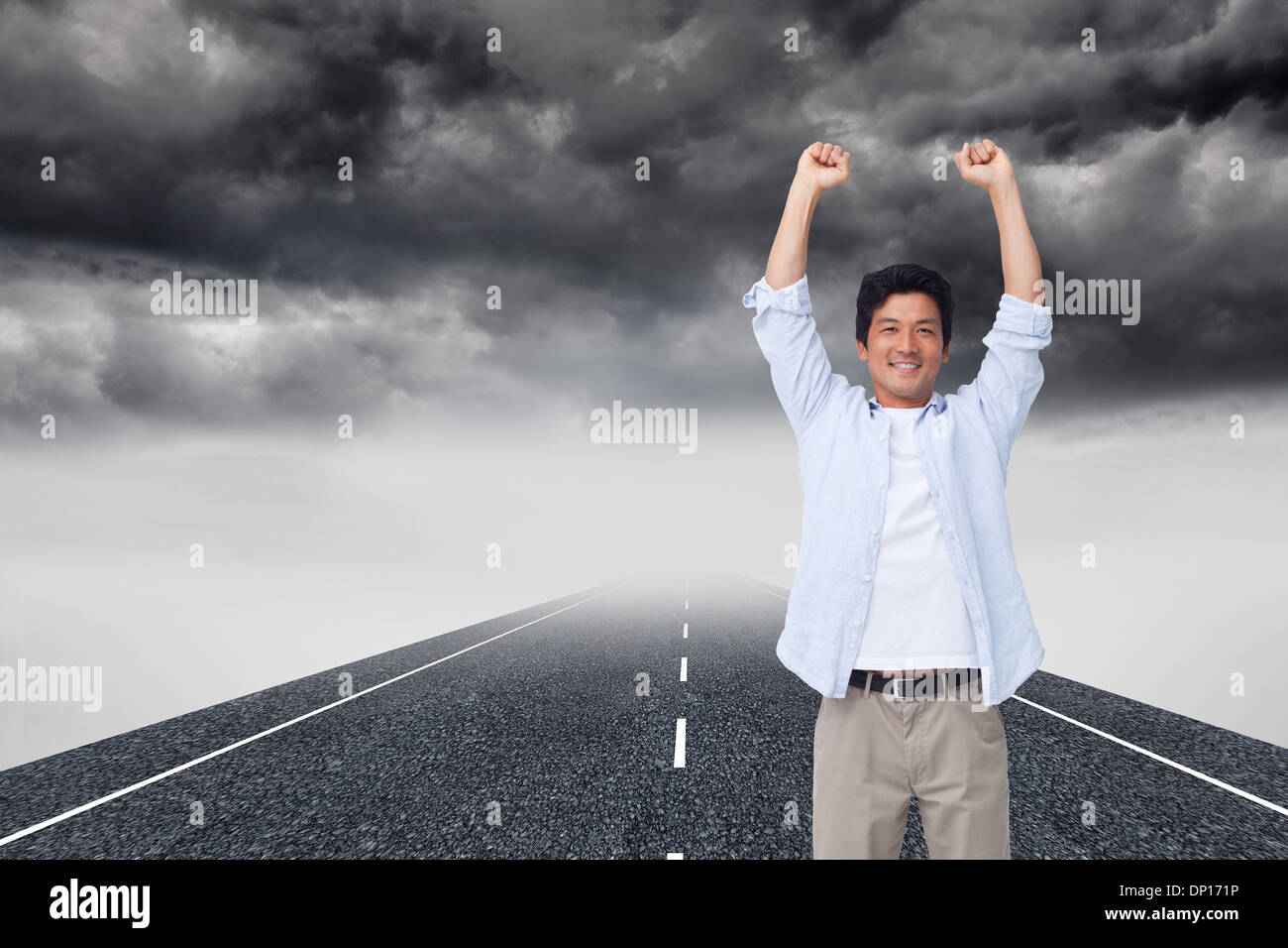 Composite image of cheering male with arms up Stock Photo - Alamy