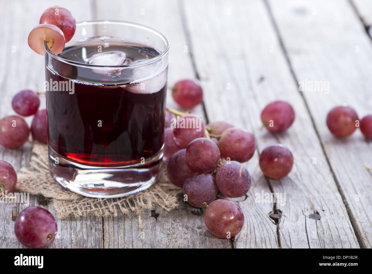 Chilled Red Grape Juice with fresh fruits Stock Photo - Alamy