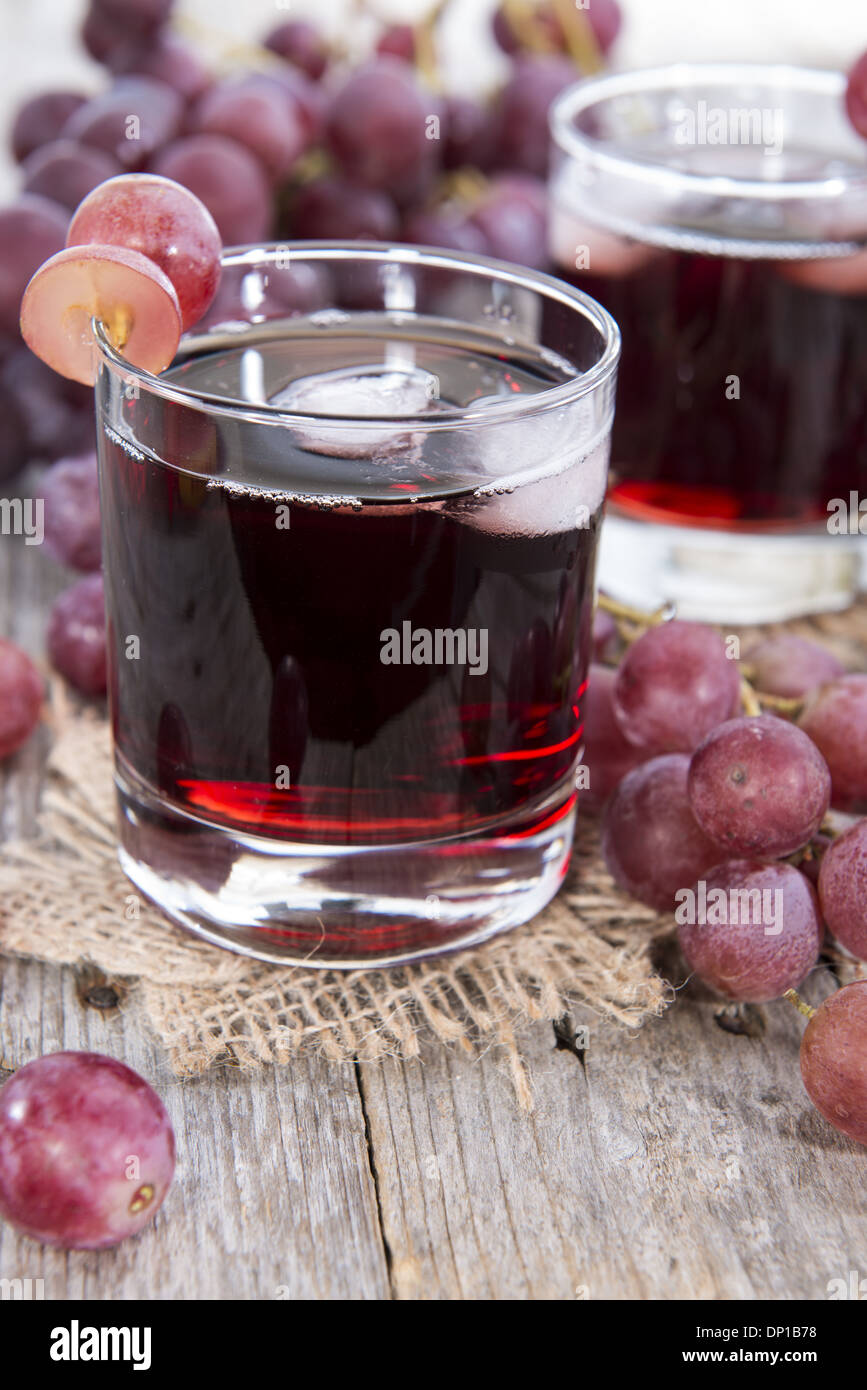 Grape Juice with Ice in a glass Stock Photo - Alamy
