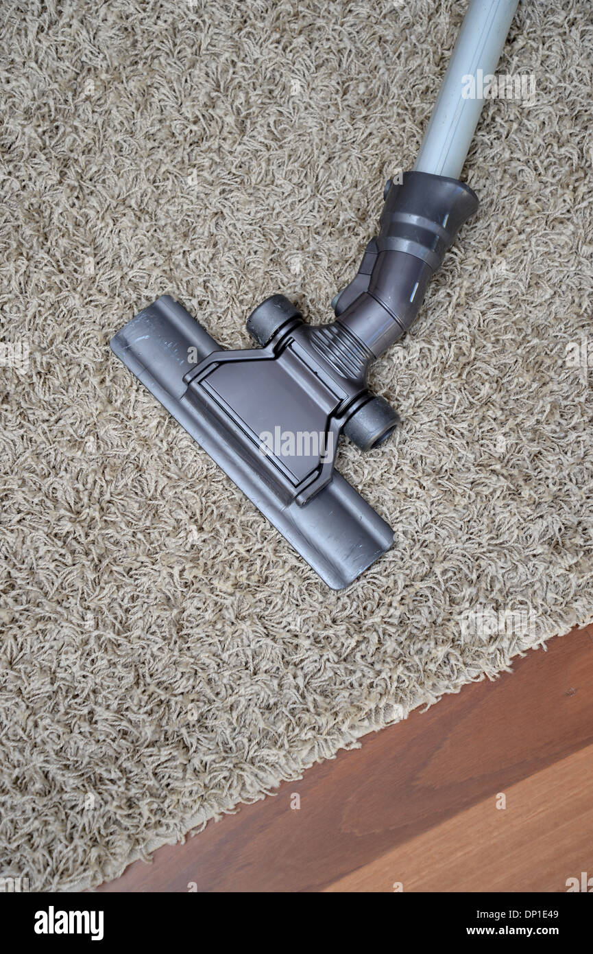 A vacuum cleaner isolated against a white background Stock Photo - Alamy