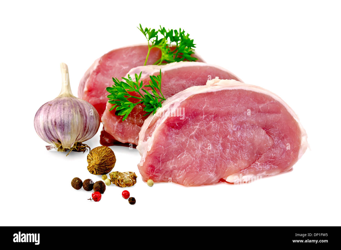 Three pork meat slice, parsley, peppercorns, garlic, nutmeg isolated on ...