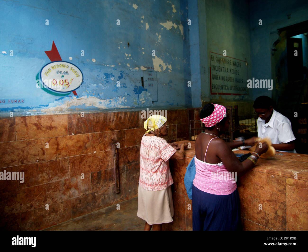 May 04, 2006; Havana, CUBA; Cuban residents wait out side the food ...
