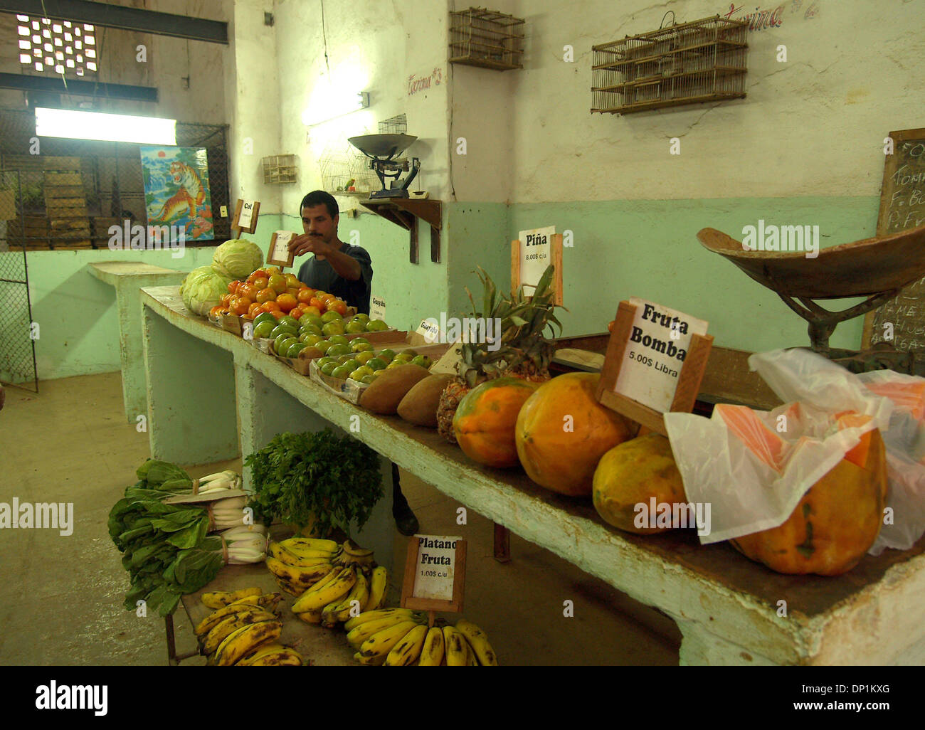 May 04, 2006; Havana, CUBA; Cuban residents wait out side the food ...
