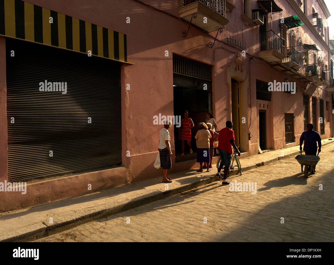 May 04, 2006; Havana, CUBA; Cuban residents wait out side the food ...