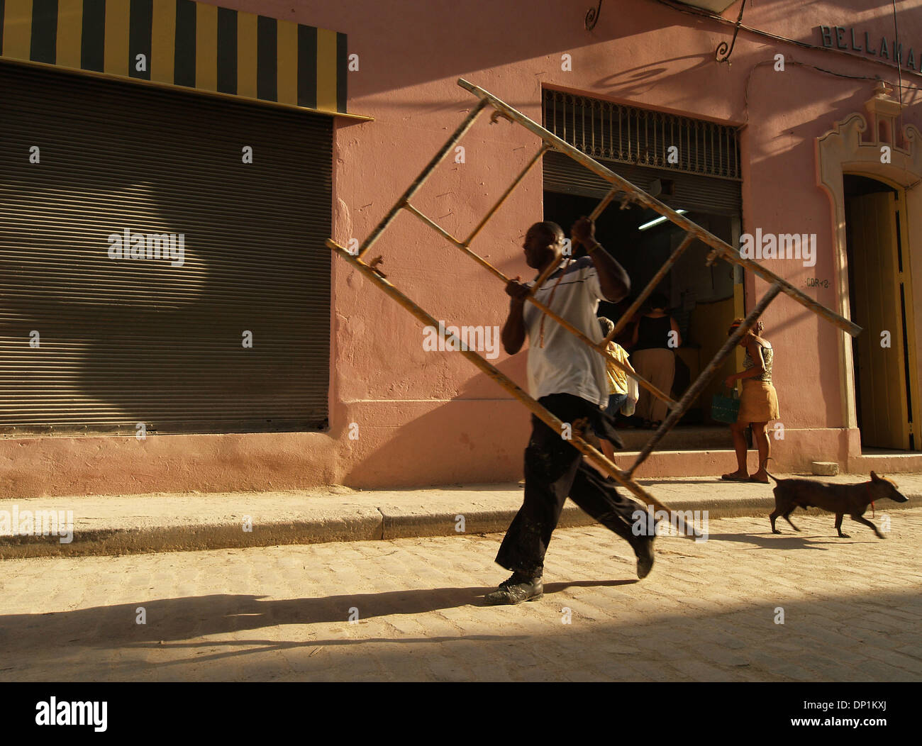 May 04, 2006; Havana, CUBA; Cuban residents wait out side the food ...