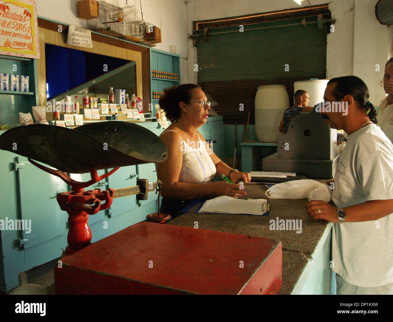 May 04, 2006; Havana, CUBA; Cuban residents wait out side the food ...
