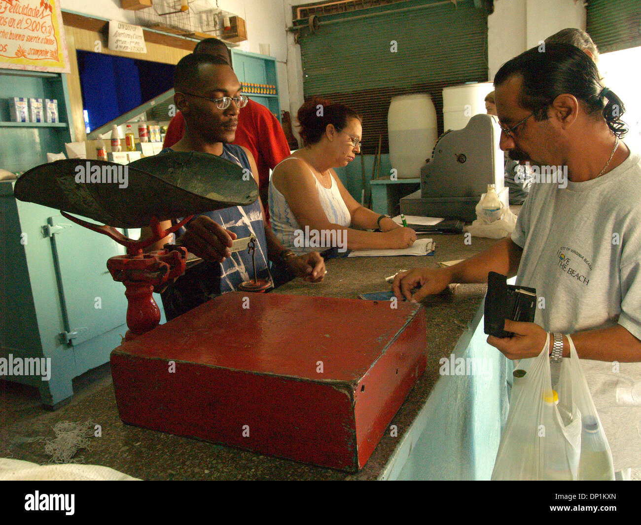 May 04, 2006; Havana, CUBA; Cuban residents wait out side the food ...