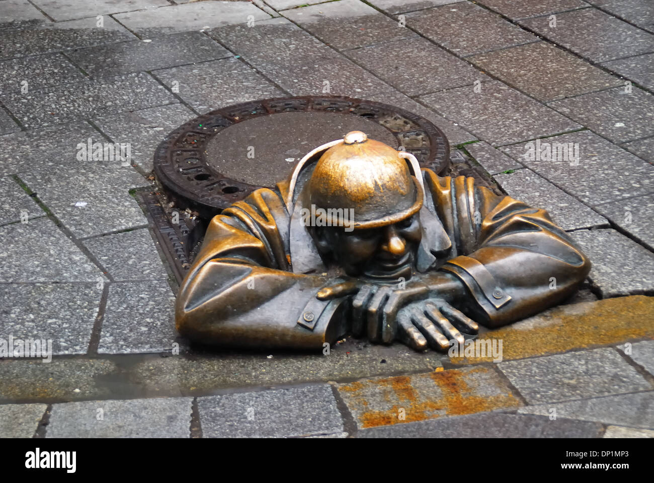 Bratislava,Slovakia. The bronze statue of Cumil Stock Photo - Alamy