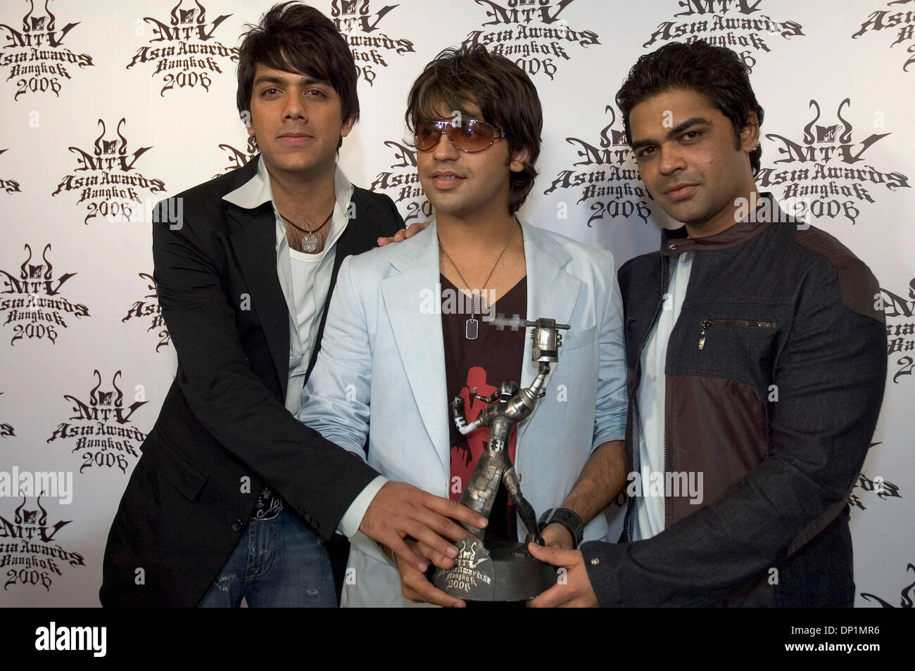 May 06, 2006; Bangkok, THAILAND; Pop trio JAL with their award for ...