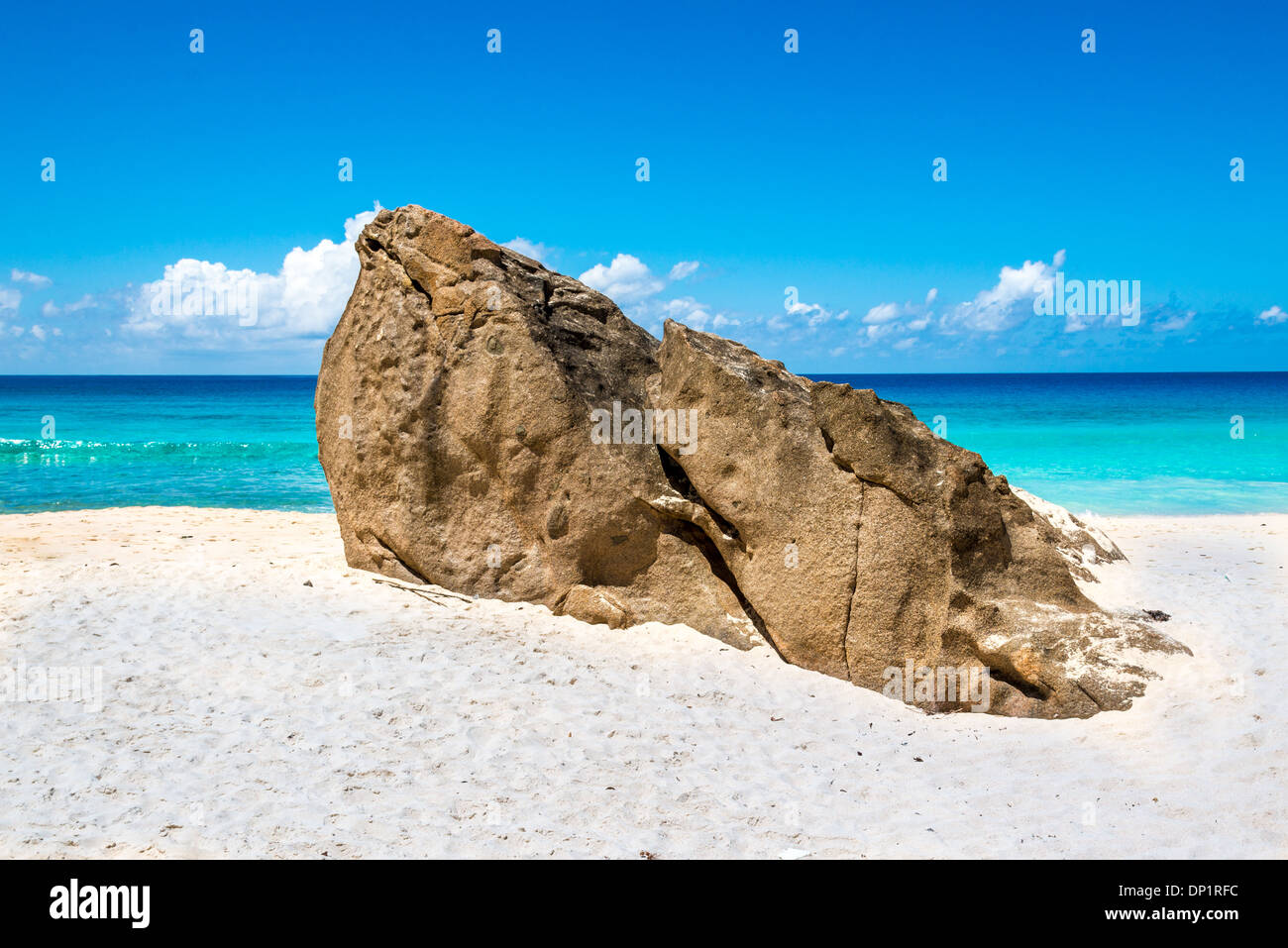 white sand beach with huge bolder Stock Photo - Alamy